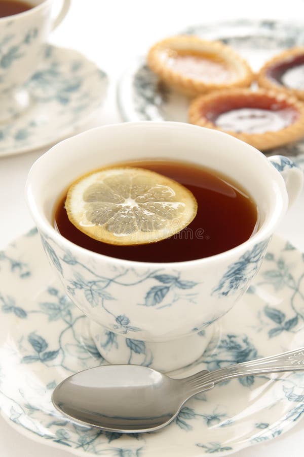Black Tea with lemon stock image. Image of afternoon - 35226459