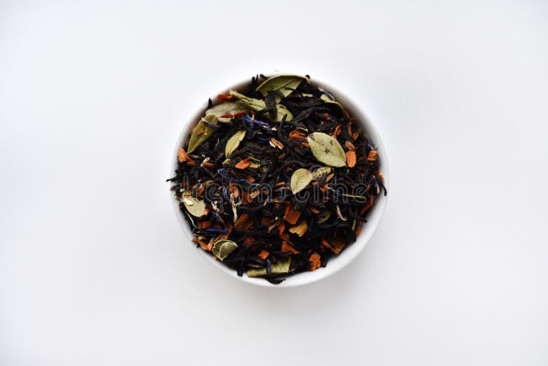 Black Tea with Spices in a Glass Cup on a White Background. Delicious ...