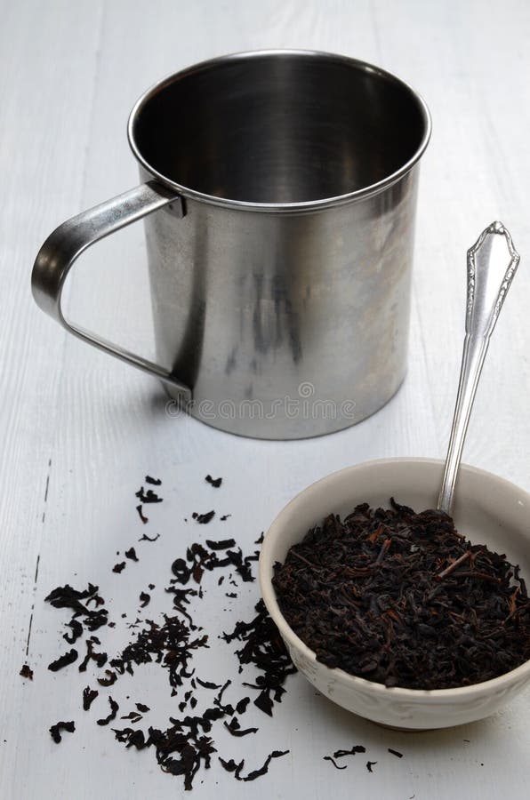 Black Tea on a Table with a Steel Cup Stock Photo - Image of black ...