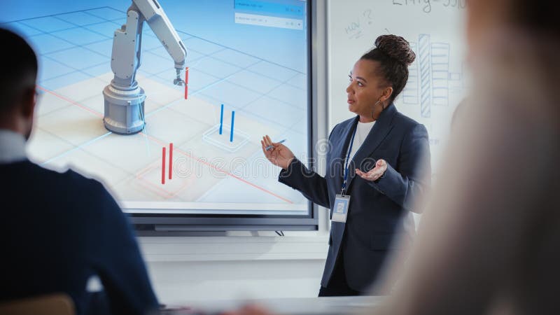 University Robotics Class: Black Teacher Explaining Engineering To ... University Robotics Class: Black Teacher Explaining Engineering To ...