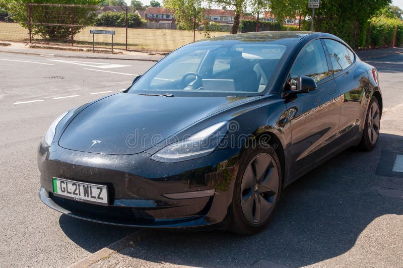 Black Tesla EV Car Parked in Street Editorial Stock Image - Image of ...