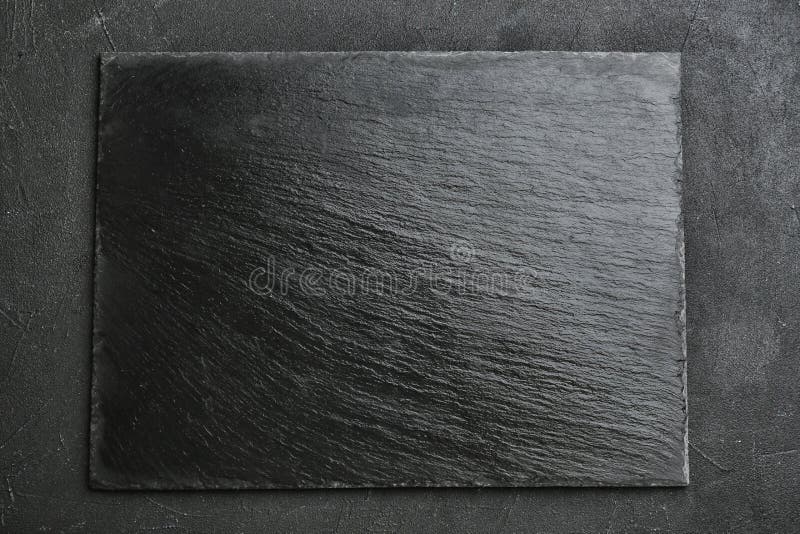 Slate Board with Different Types of Delicious Cheese and Snacks on Grey ...