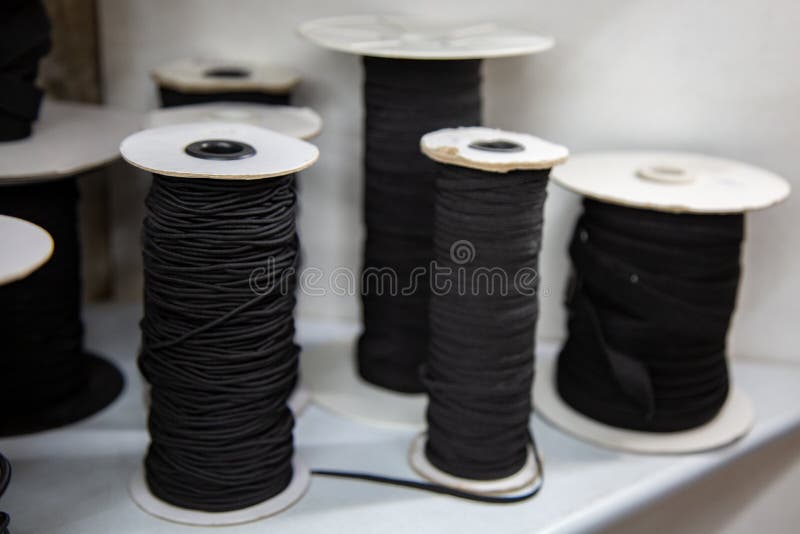 Black Thread Spools Used in Fabric Industry Stock Photo - Image of ...