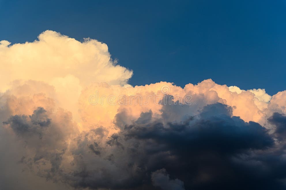Black Thundercloud Sunset Divides the Sky in Half Stock Photo - Image ...