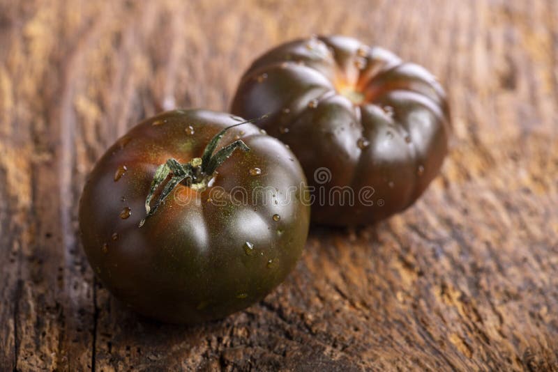 Black tomatoes stock photo. Image of snack, rustic, seasoning - 245166560