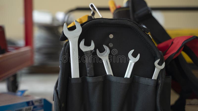 Black tool bag with wrench stock photo. Image of industrial - 214217528