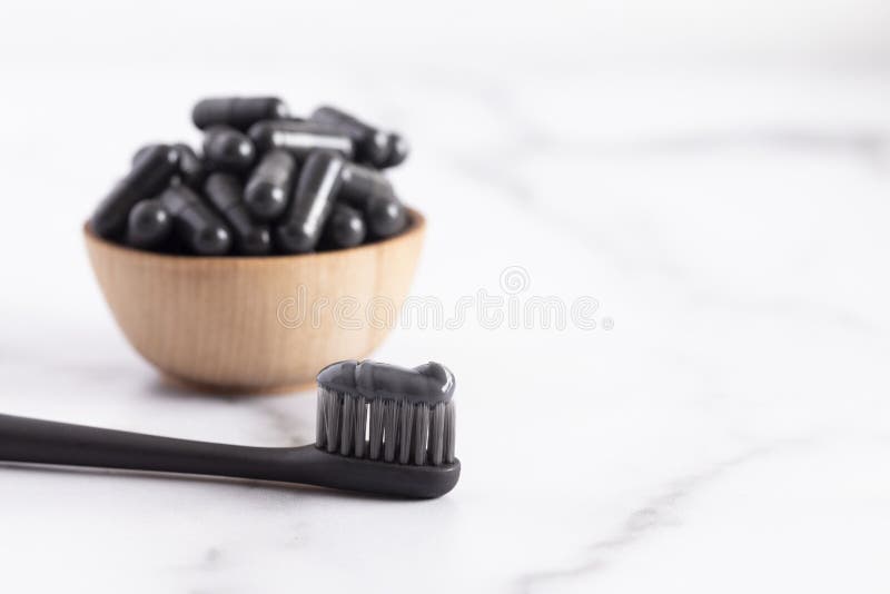 Black Toothpaste with Capsule of Activated Charcoal Stock Image - Image ...