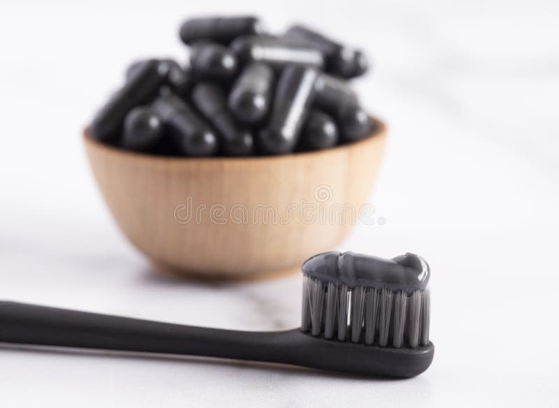 Black Toothpaste with Capsule of Activated Charcoal Stock Image - Image ...
