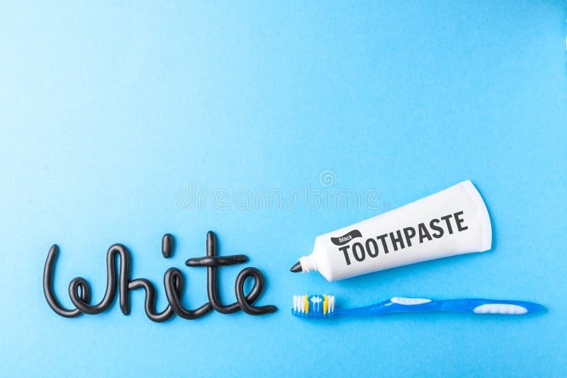 Black Toothpaste from Charcoal for White Teeth. Word WHITE from Black ...
