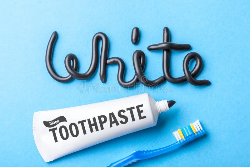 Black Toothpaste from Charcoal for White Teeth. Word WHITE from Black ...