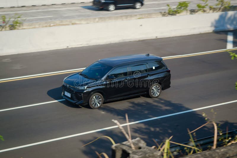Black Toyota Avanza Driving Fast on Trans Java Highway Blurry in Motion ...