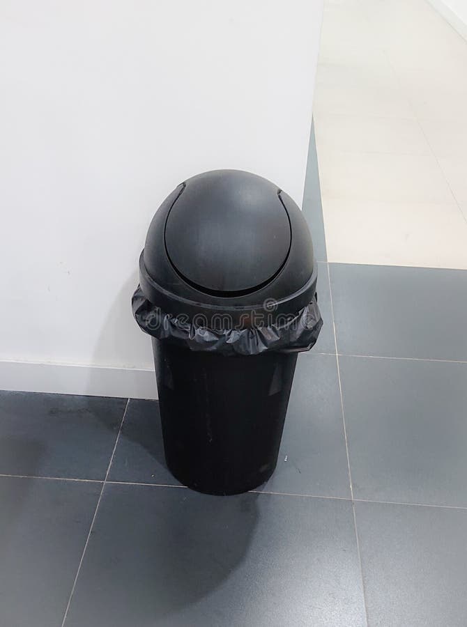 Black Trash Can in the Room and the Black Tile Stock Photo - Image of ...