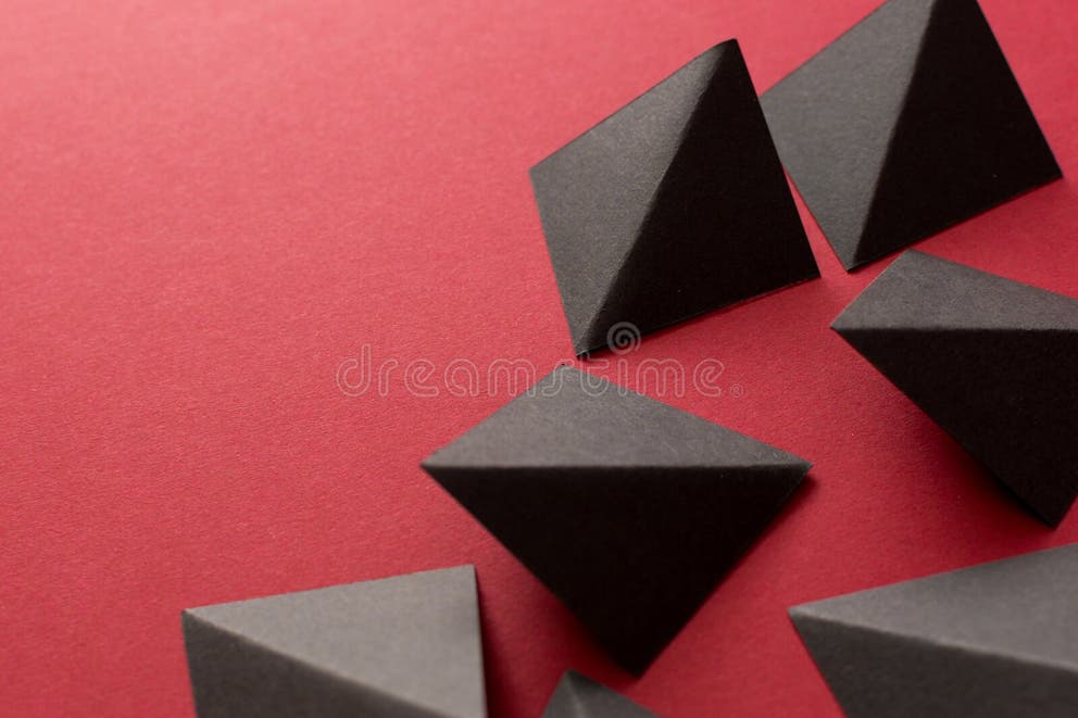 Black Triangle Shapes on Red Background Stock Photo - Image of paper ...