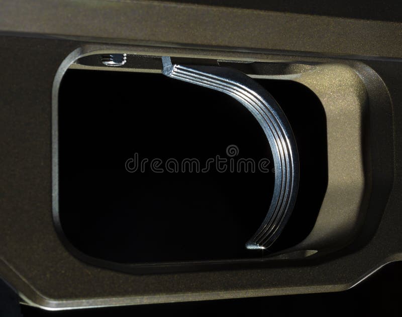 Black Trigger on a Copper Colored Rifle Stock Photo - Image of black ...
