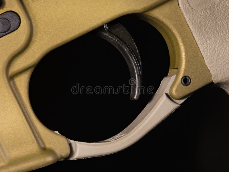 Black Trigger on a Gold Colored AR-15 Stock Image - Image of polymer ...