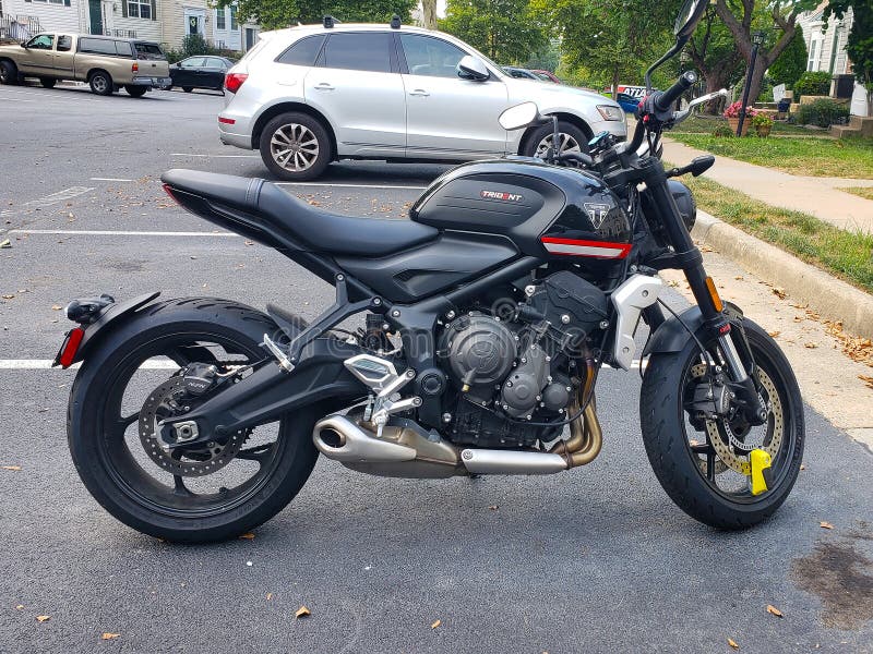 Black Triumph Motorcycle in the Parking Lot Editorial Stock Image ...
