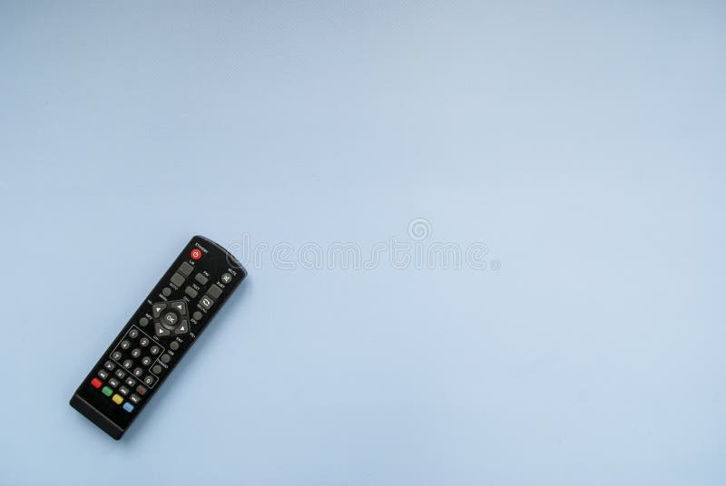Black Tv Remote on a Blue Background Stock Photo - Image of video ...