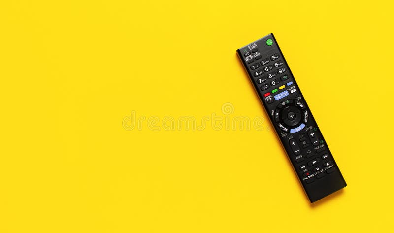 Black TV Remote Control on Bright Yellow Background Flat Lay Top View ...