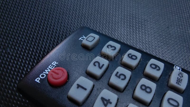 Black Tv Remote and Gray Button and Red Power Button Stock Photo ...
