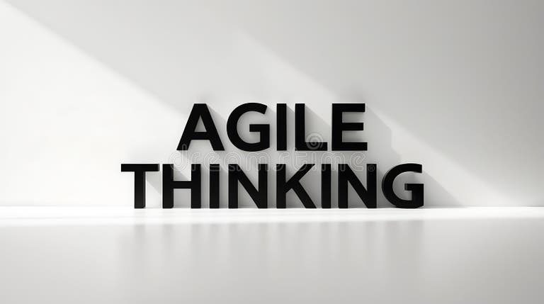 Black Typography Reading Agile Thinking on a Light Surface with Dappled ...