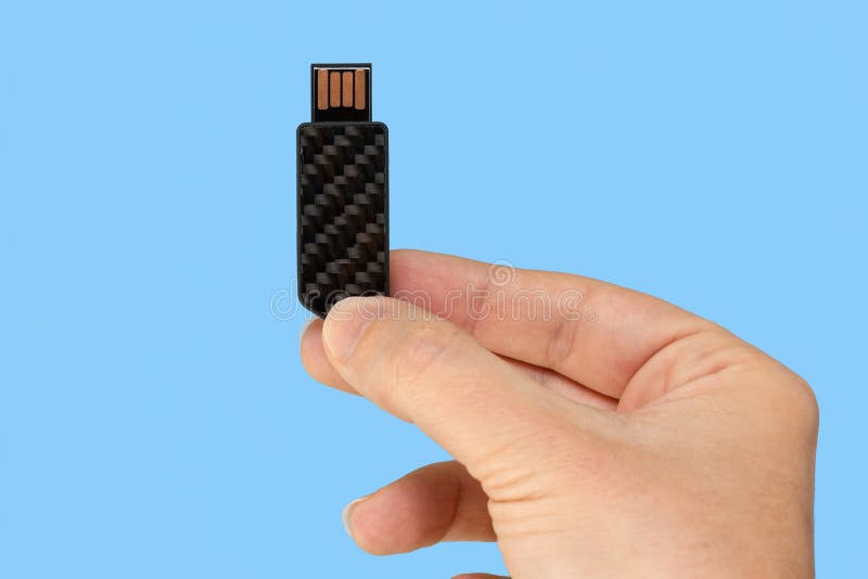 Black USB Memory Stick in Hand Stock Photo - Image of black, media ...
