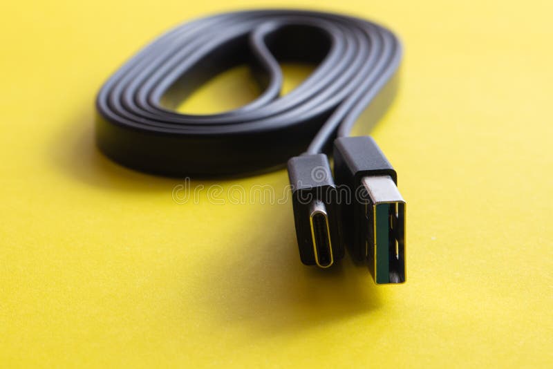 Black USB Type-C Cord on Yellow Background Stock Photo - Image of ...