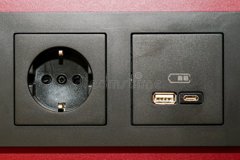 A Black 220V, USB and USB C Type Socket Block is Built into the Wall ...