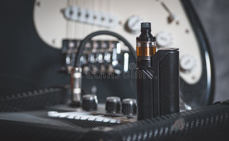 Black Vaporizer in the Smoke Stock Photo - Image of guitar, device ...