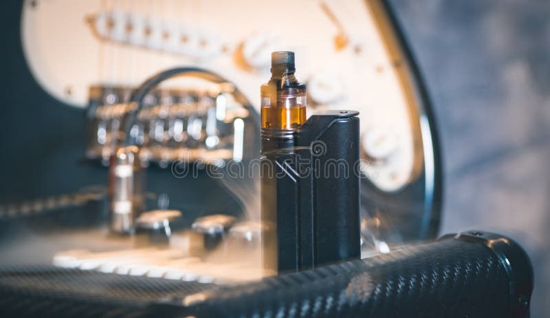 Black Vaporizer in the Smoke Stock Photo - Image of electronic ...