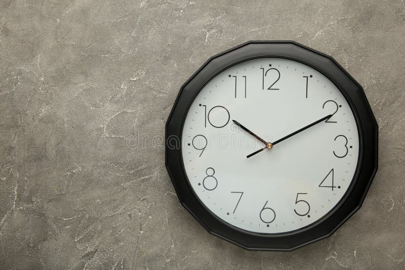 Black Wall Clock on the Grey Background Stock Image - Image of dial ...