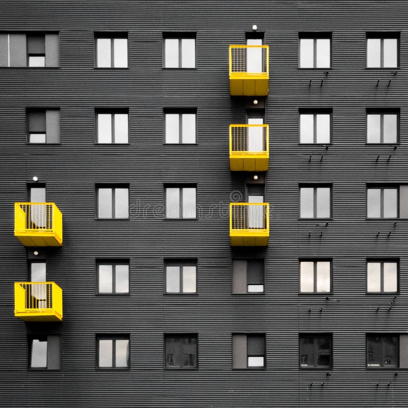Black Wall with Yellow Terrace - Building Facade Stock Image - Image of ...