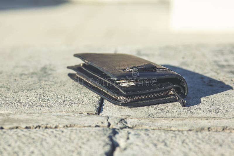 Black Wallet with Cash is Lying Lost on Bench Stock Photo - Image of ...