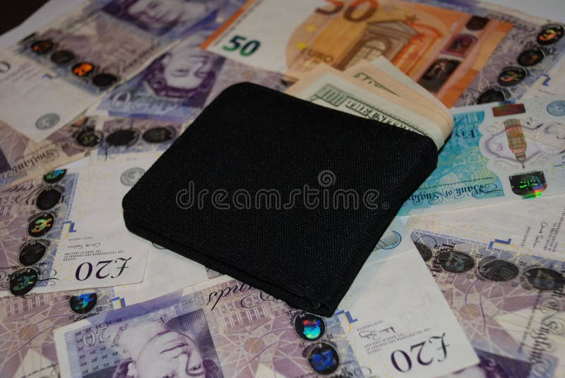 Black Wallet on Various International Currency Notes Editorial Photo ...