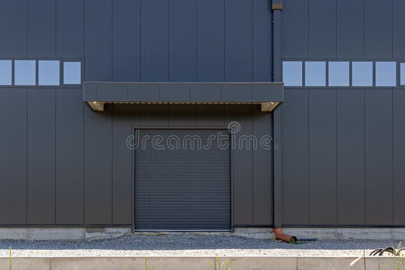Black Warehouse Door stock photo. Image of roll, logistics - 257591404