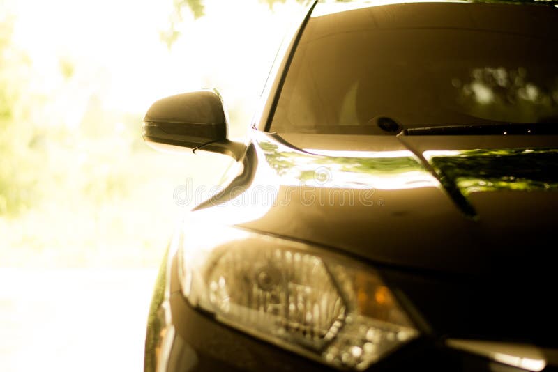 The Black Car Under the Sun Lights Stock Photo - Image of appeared ...