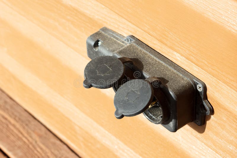 Black Waterproof Outdoor Electrical Outlet with Rubber Cap Stock Image ...