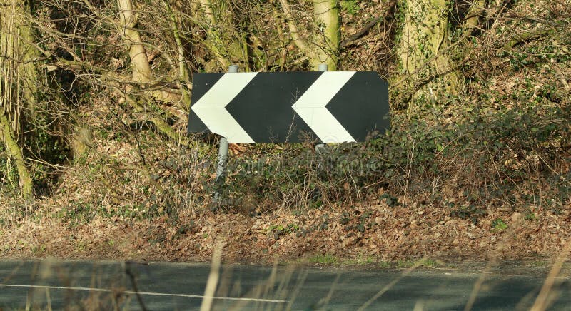 Black and White Arrows Left Sign Stock Photo - Image of hazard ...