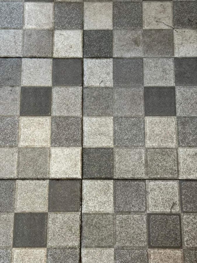 A Black and White Background with a Square Texture of Floor Tiles that ...