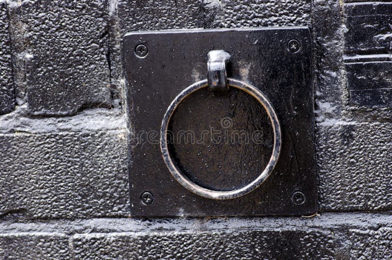 Black and White Brick Wall, Metal Round Handle. Stock Image - Image of ...