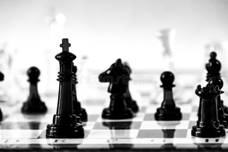 The Black and White Chess Board with Black Coins Stock Photo - Image of ...
