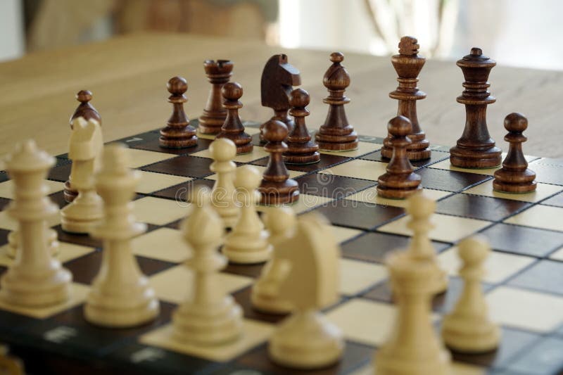 Black and White Chess Pieces on a Board - Side View Stock Photo - Image ...