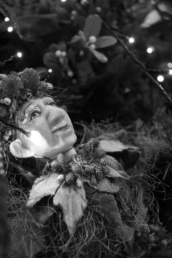 Laid Back Elf on Black and White Christmas Tree. Stock Image - Image of ...