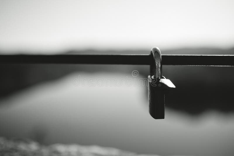 Black and White Closeup Shot of a Lock on a Pole Stock Photo - Image of ...