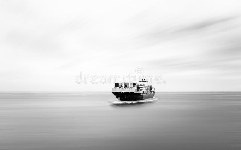 Black and White Container Ship Sailing in Deep Sea for Transporting ...