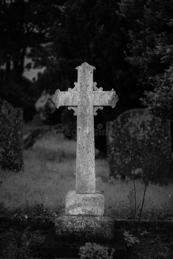 Black and White Gravestone Cross in Cemetery Graveyard in Evening Stock ...
