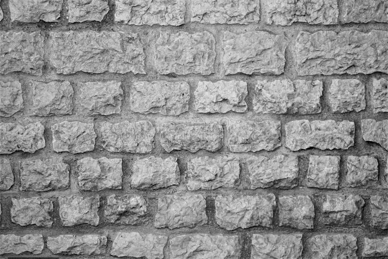 Black and White Hand Hewn Stone Wall with Square Blocks of Limestone ...