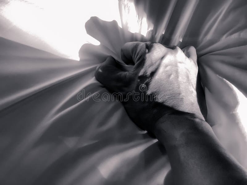 Passionate Couple Gripping Sheets Stock Photos - Free & Royalty-Free ...