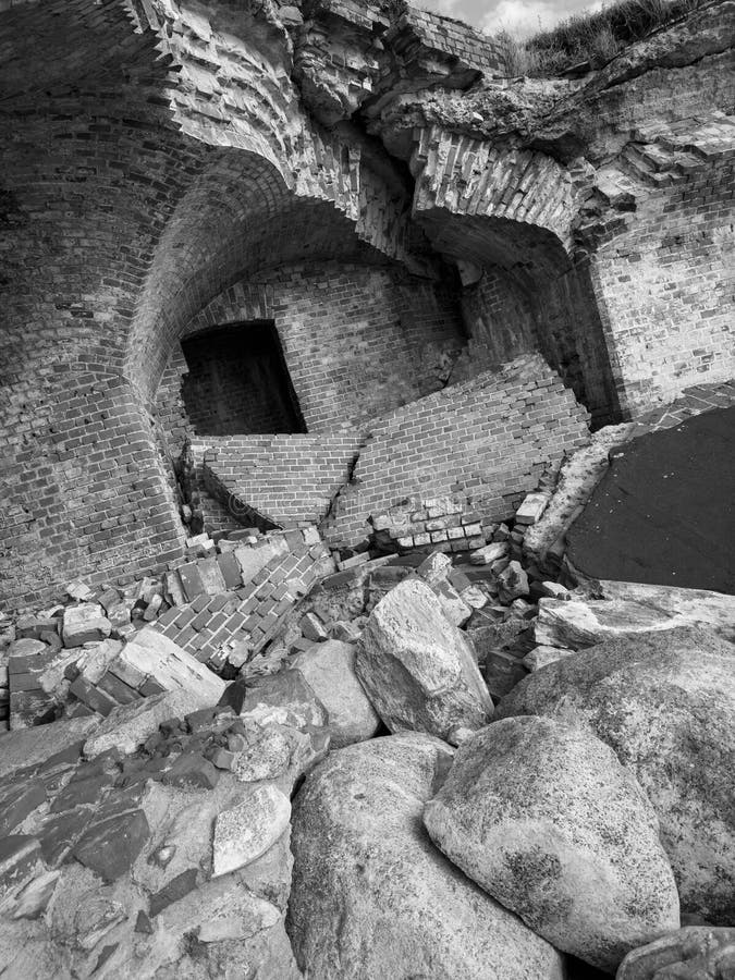 Crumbling Brick Arch Structure with Fallen Debris and Rocks Stock Image ...