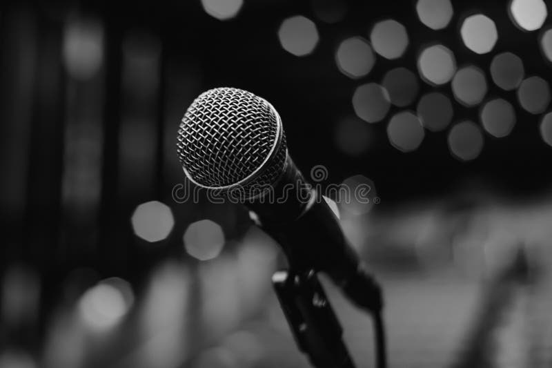 Microphone on Theater Stage before Concert Surrounded by Vacant Seats ...