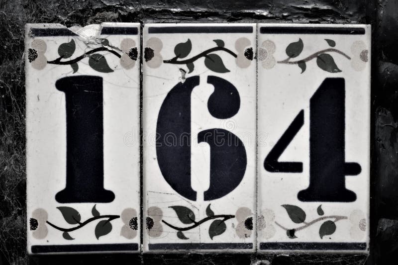 Black and White Image. an Old House Number Plate. Number 164. Stock ...